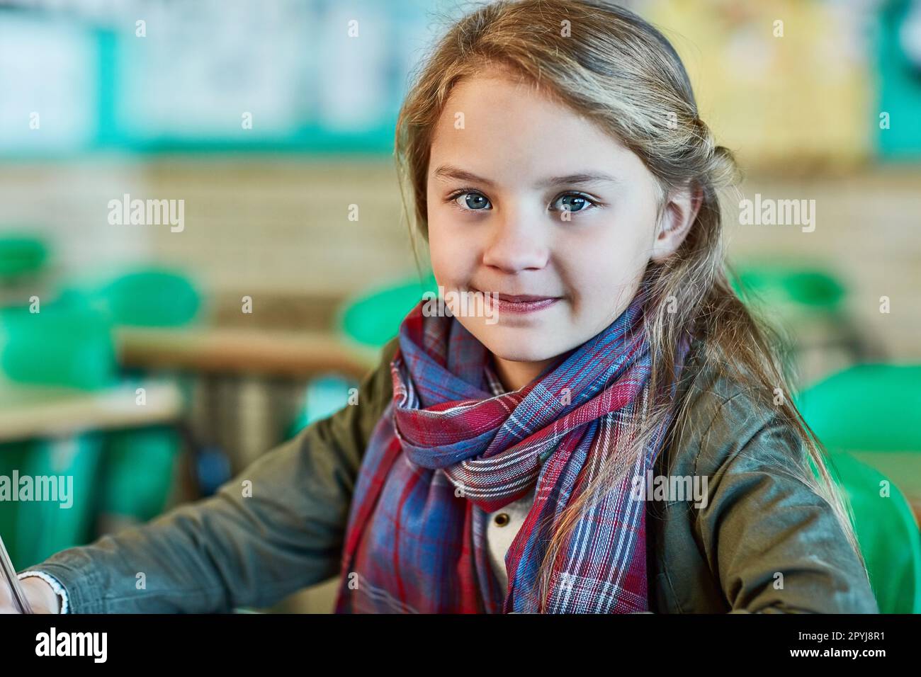 I cant wait for the lesson to begin. an elementary school girl in the ...