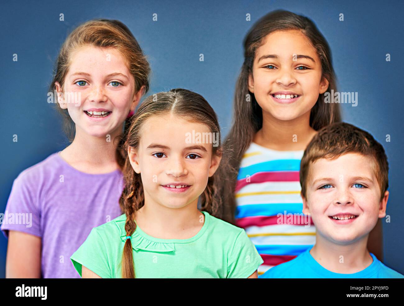 The different faces of youth. Studio shot of a diverse group of kids ...