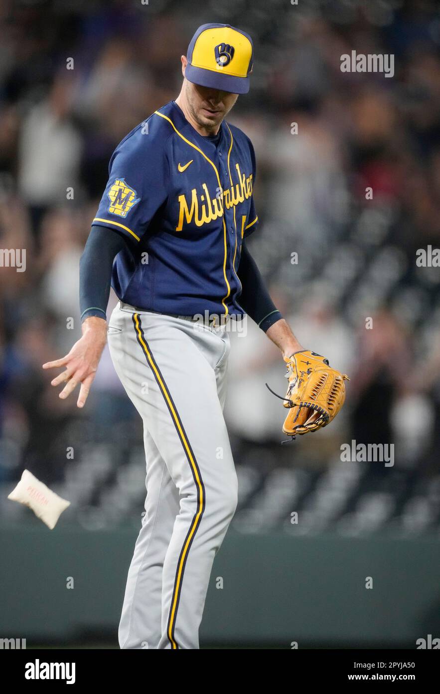Milwaukee Brewers relief pitcher Jake Cousins reacts after giving up a ...