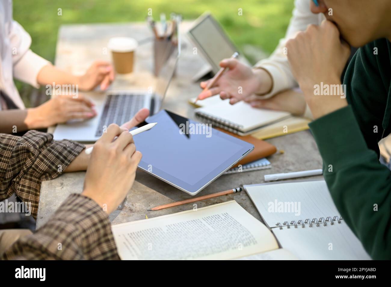 Close-up image, Group of Asian college students working on their school ...