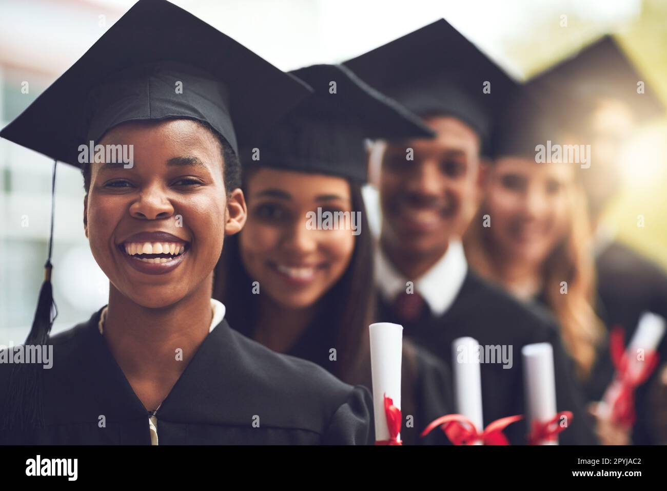 Lining up the leaders of tomorrow. a group of fellow students standing ...