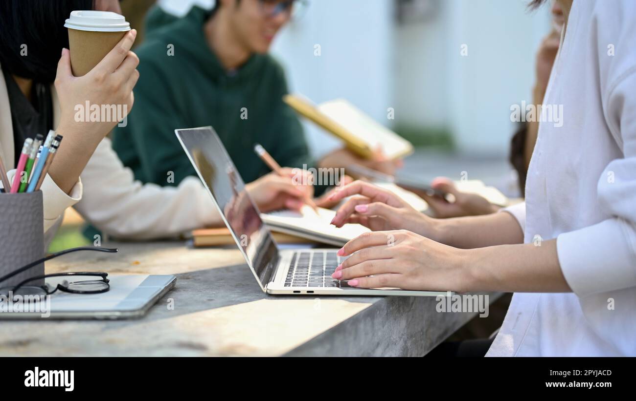 High school student typing at laptop hi-res stock photography and ...