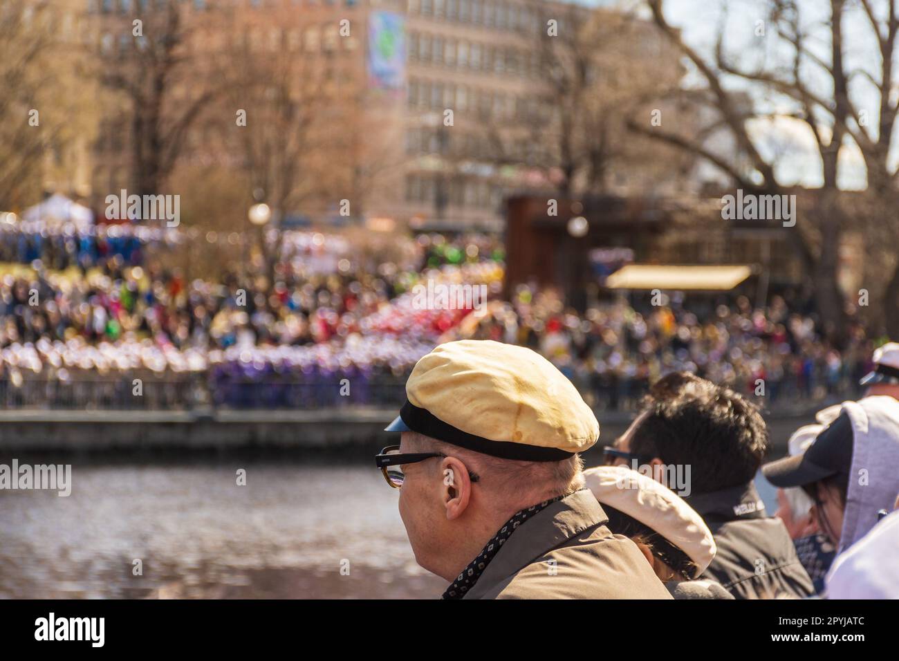 Man wearing an old graduation cap on at May day Student dipping ...