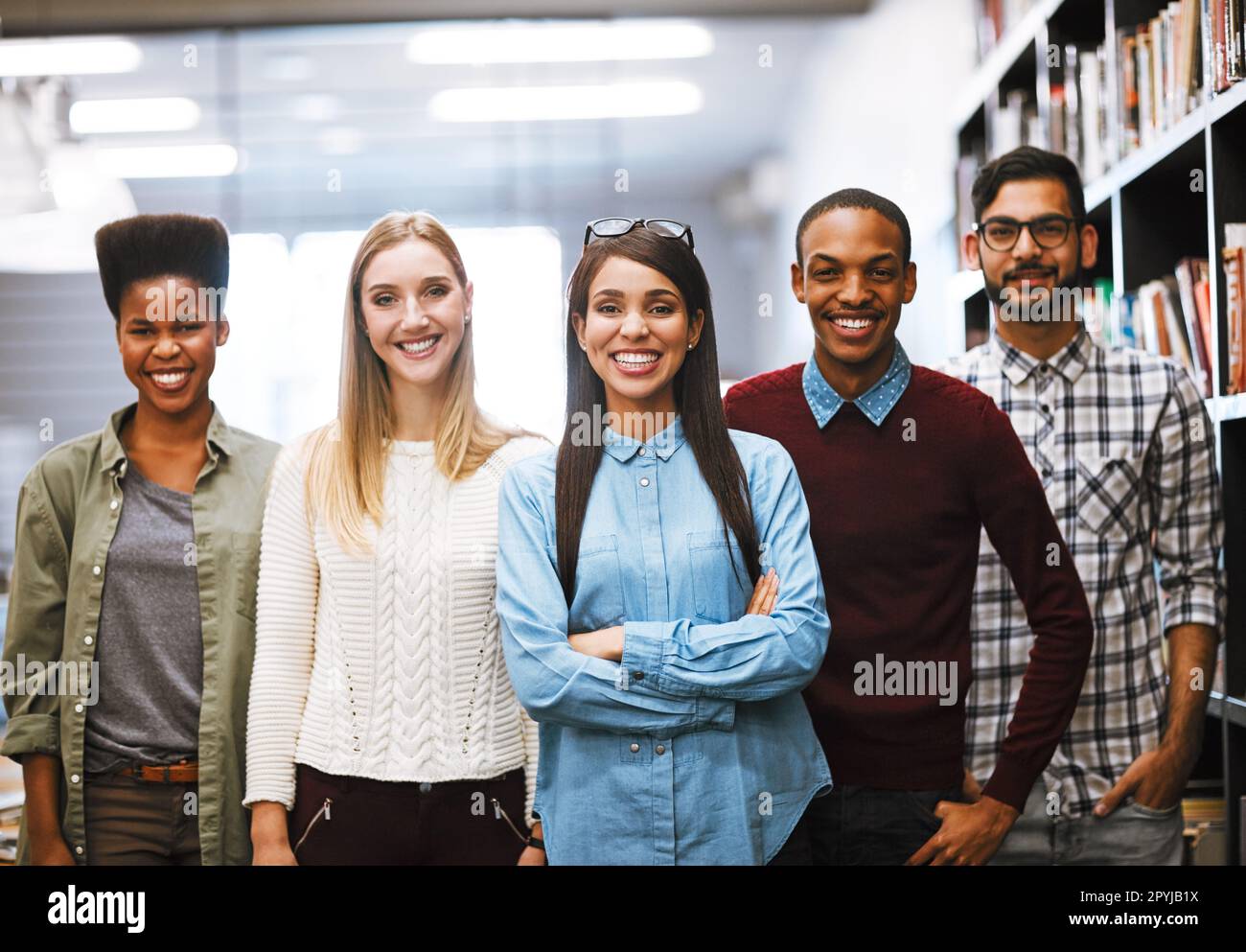 Higher education is the way to go. university students standing in the ...