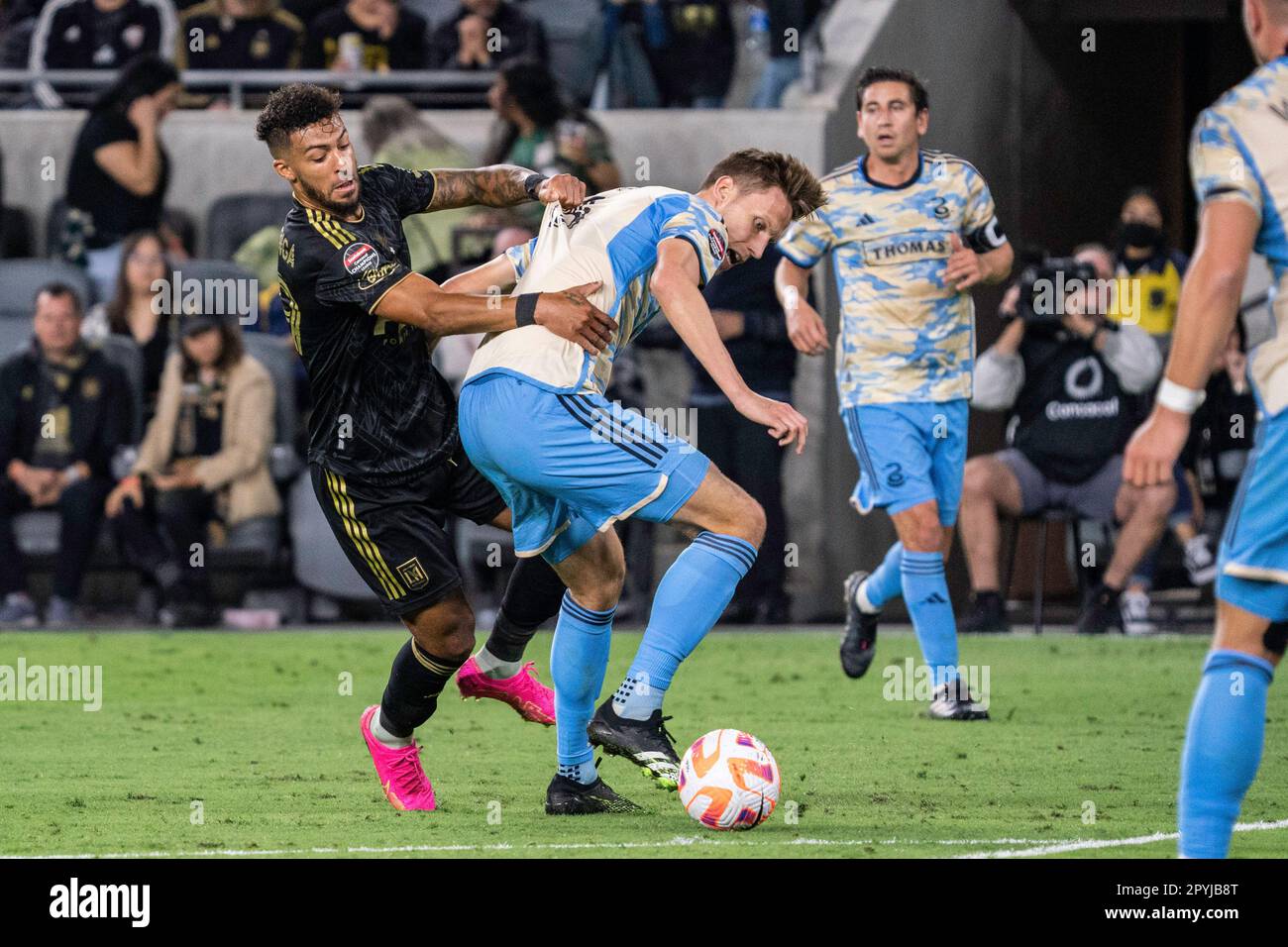 Philadelphia Union defender Jack Elliott (3) fends off LAFC forward ...