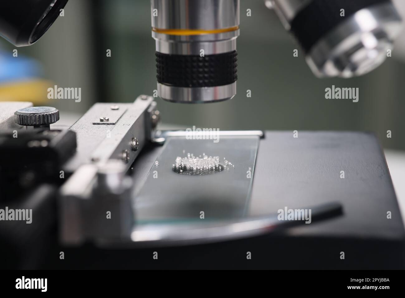 Scientist studies sugar crystals under electronic microscope Stock ...