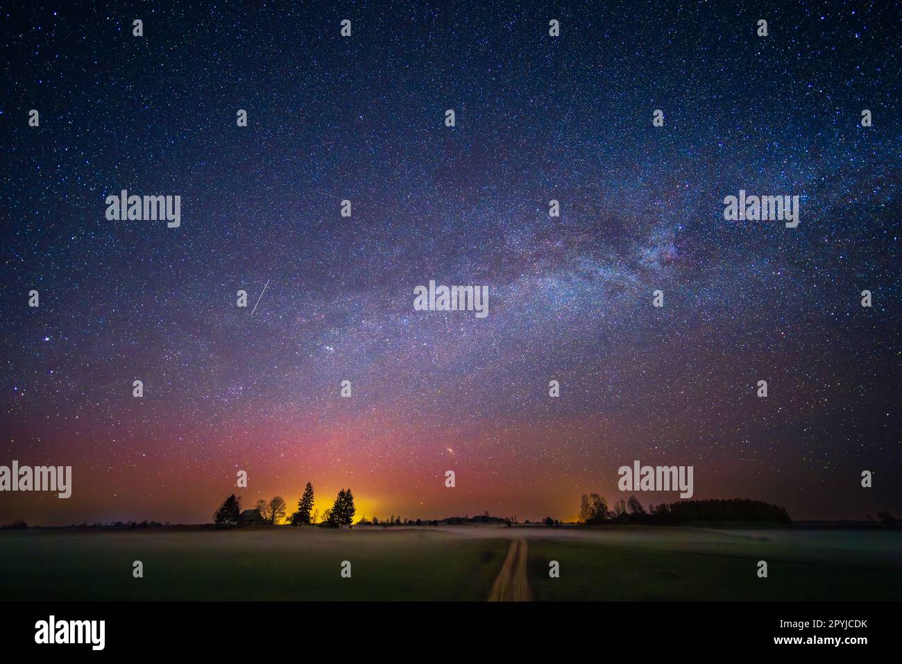Milky way galaxy glowing at night Stock Photo - Alamy