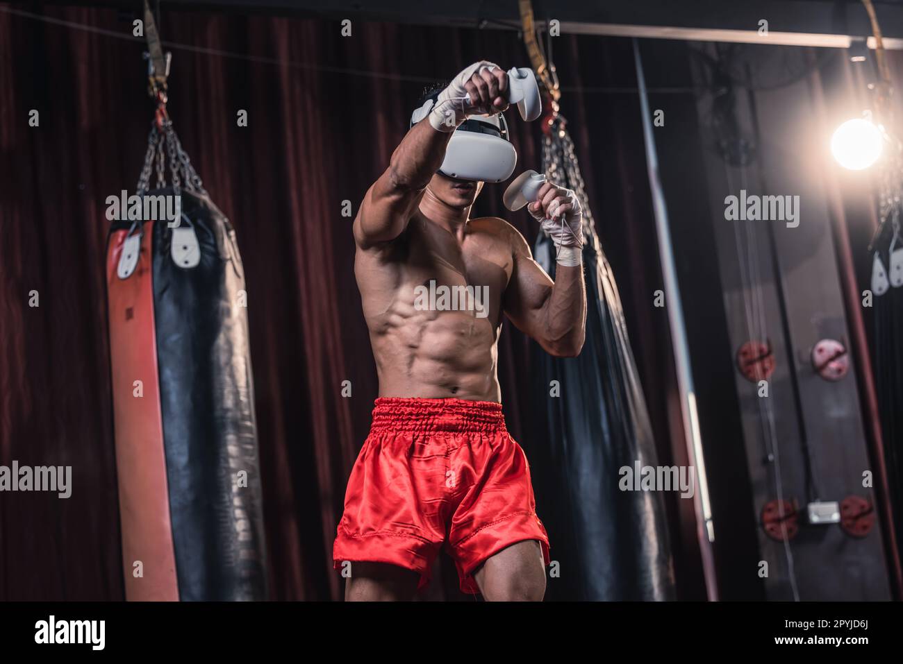 Professional boxer wear virtual reality headsets to engage in immersive ...