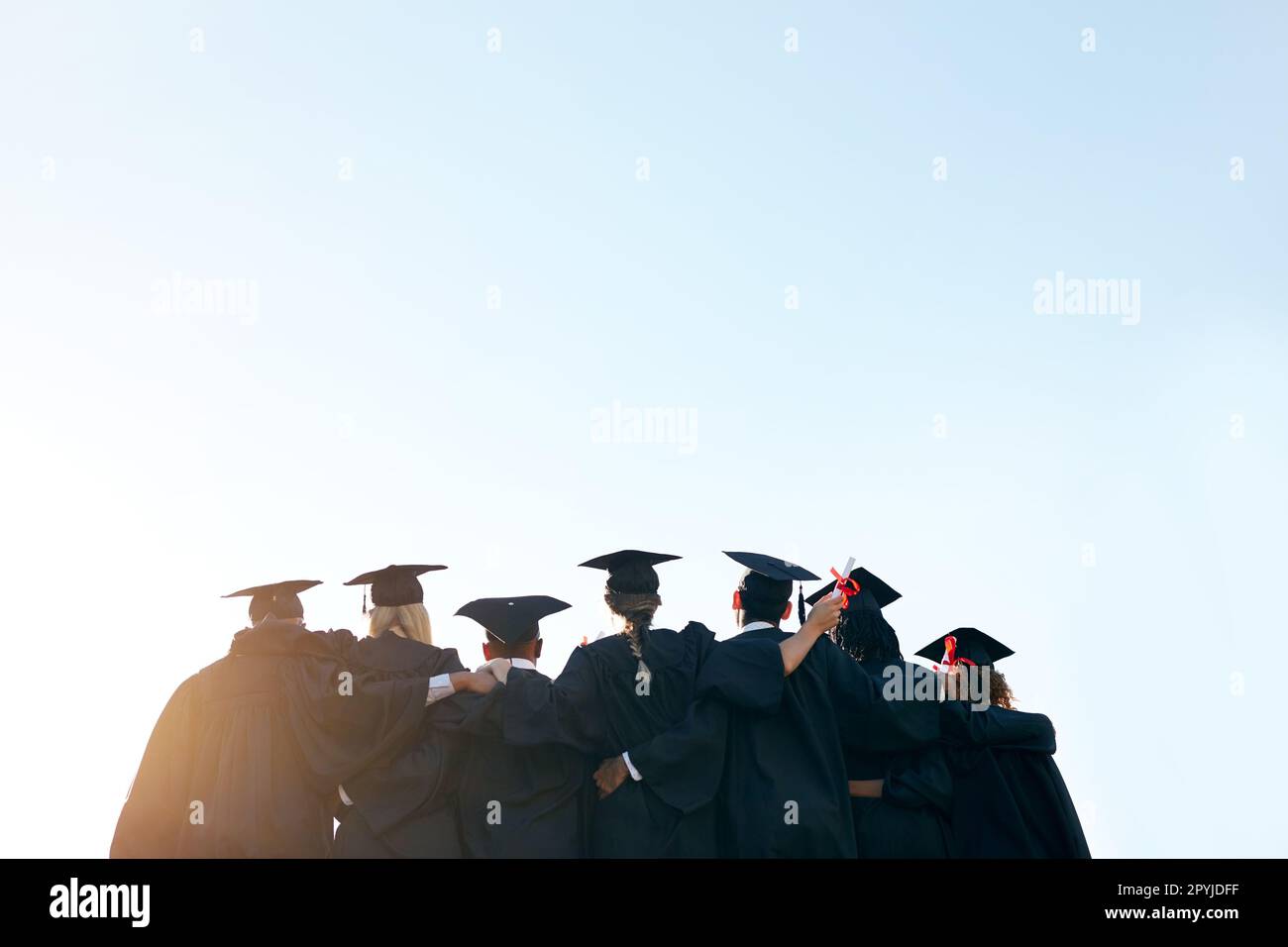 Our journey will be filled with greatness. Rearview shot of a group of ...