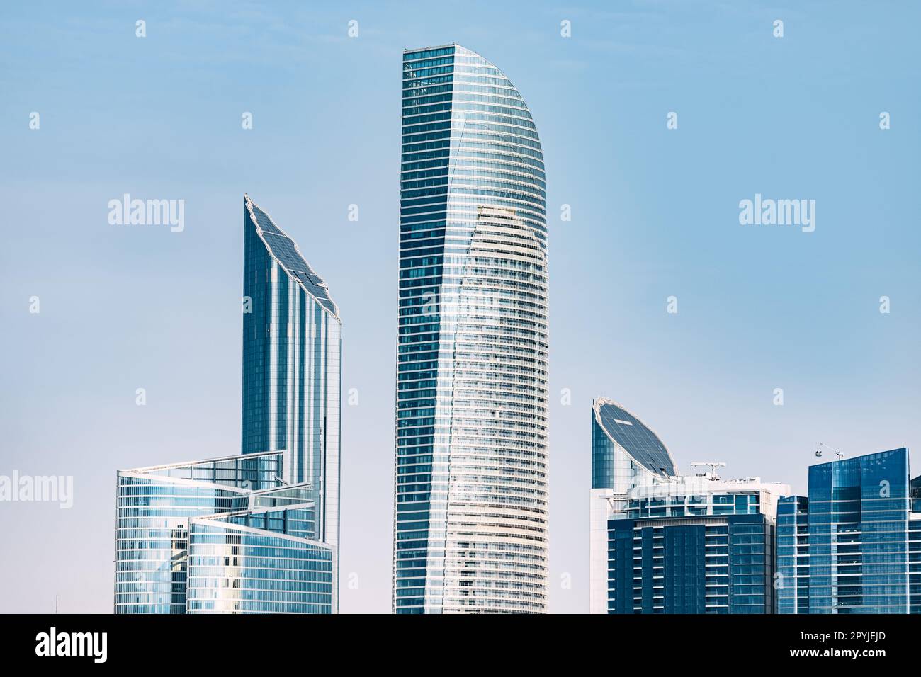 Marvel at the breathtaking beauty of Abu Dhabi's towering buildings ...