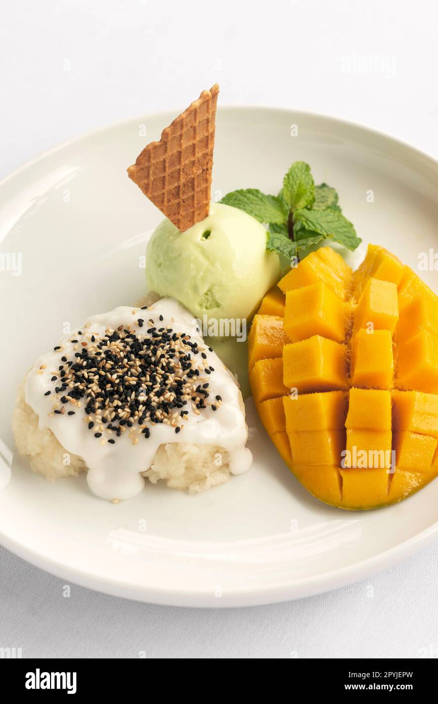Mango with Sticky Rice and Pandan ice cream Thai famous dessert Stock ...