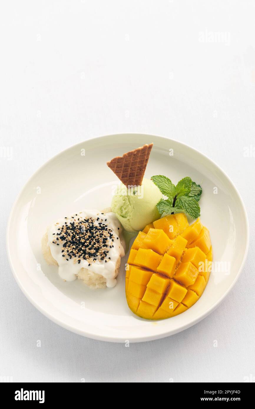Mango with Sticky Rice and Pandan ice cream Thai famous dessert Stock ...
