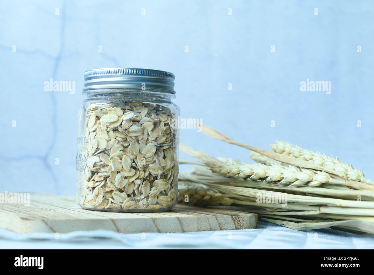 roasted oats flakes in a jar on table Stock Photo - Alamy