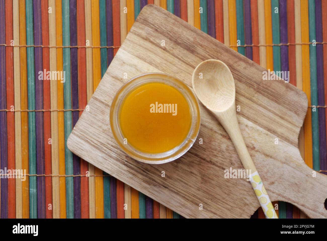 homemade ghee in container on a table Stock Photo - Alamy