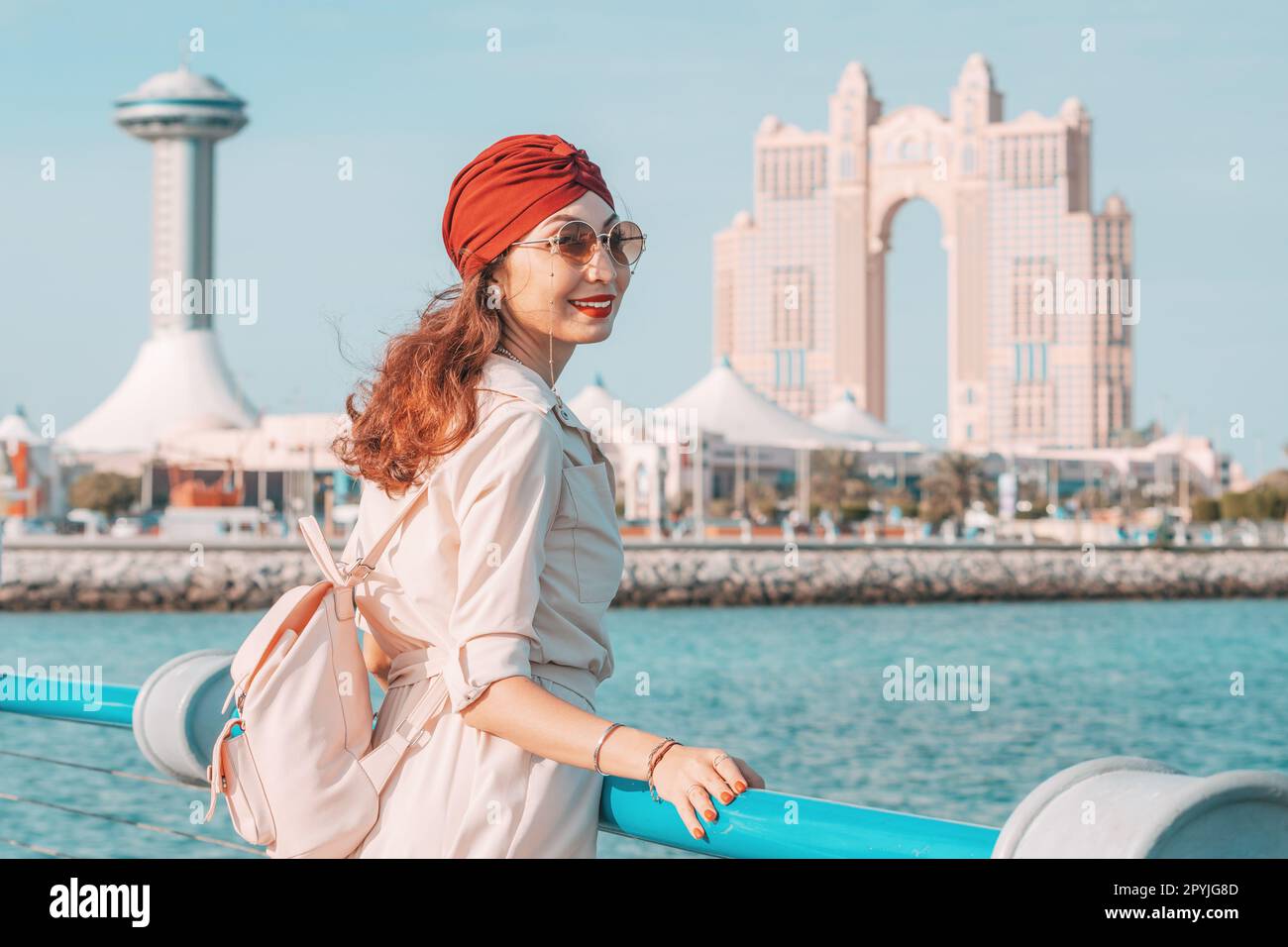 Indian Girl walking along the Corniche promenade in Abu Dhabi, UAE ...