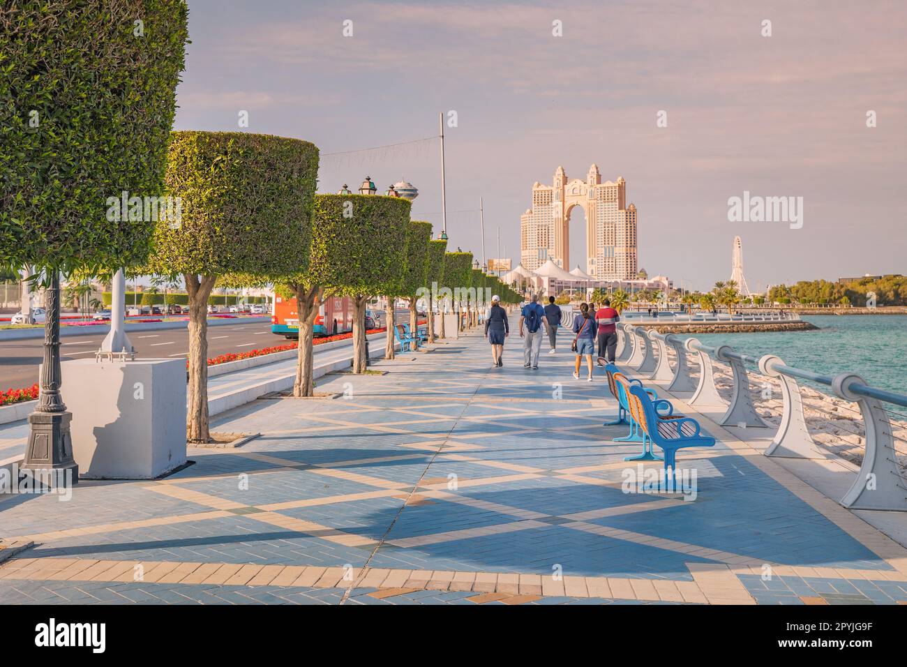 15 January 2023, Abu Dhabi, UAE: a leisurely walk on the Corniche is a ...