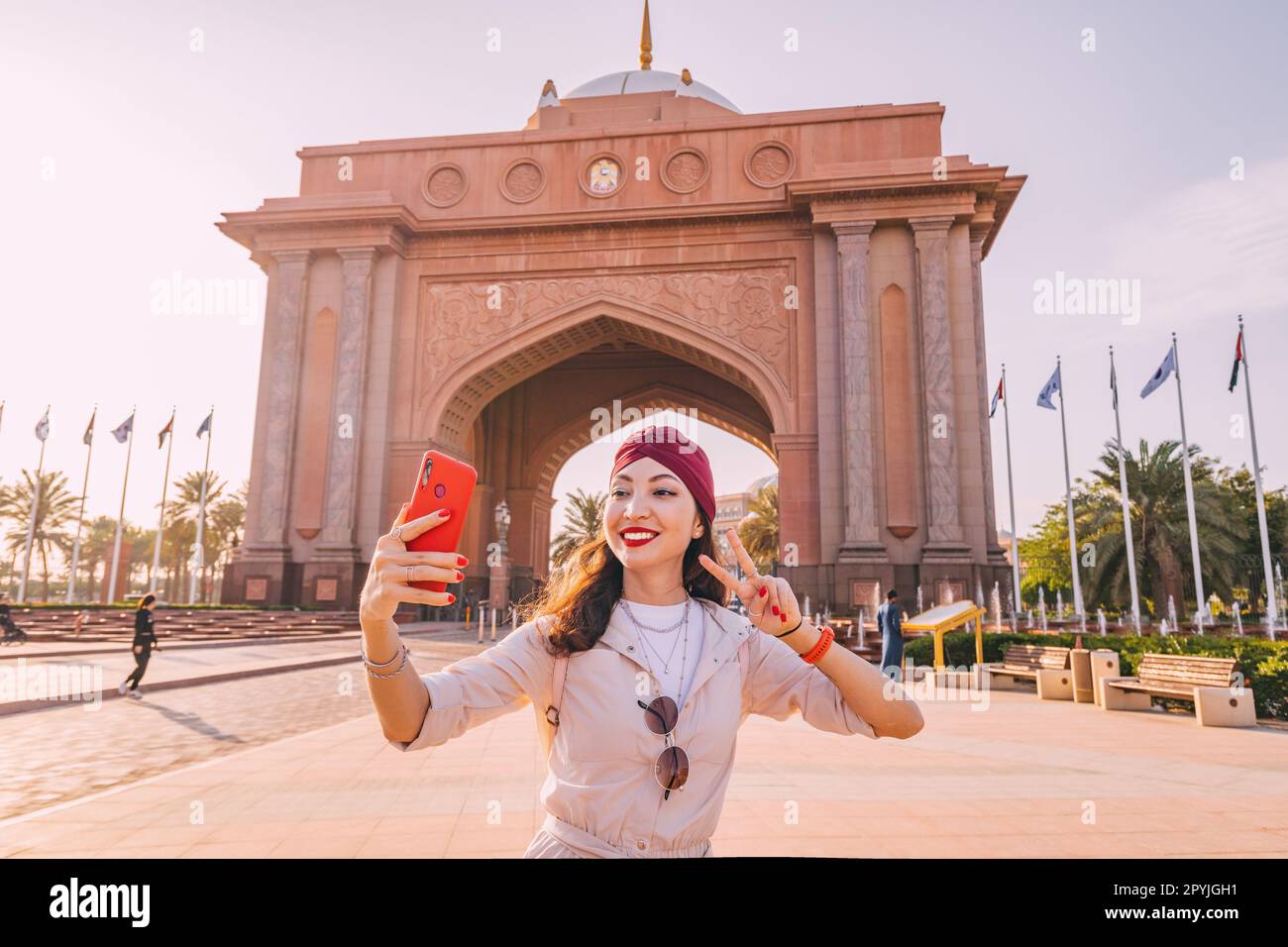 15 January 2023, Abu Dhabi, UAE: Happy indian girl taking selfie photos ...
