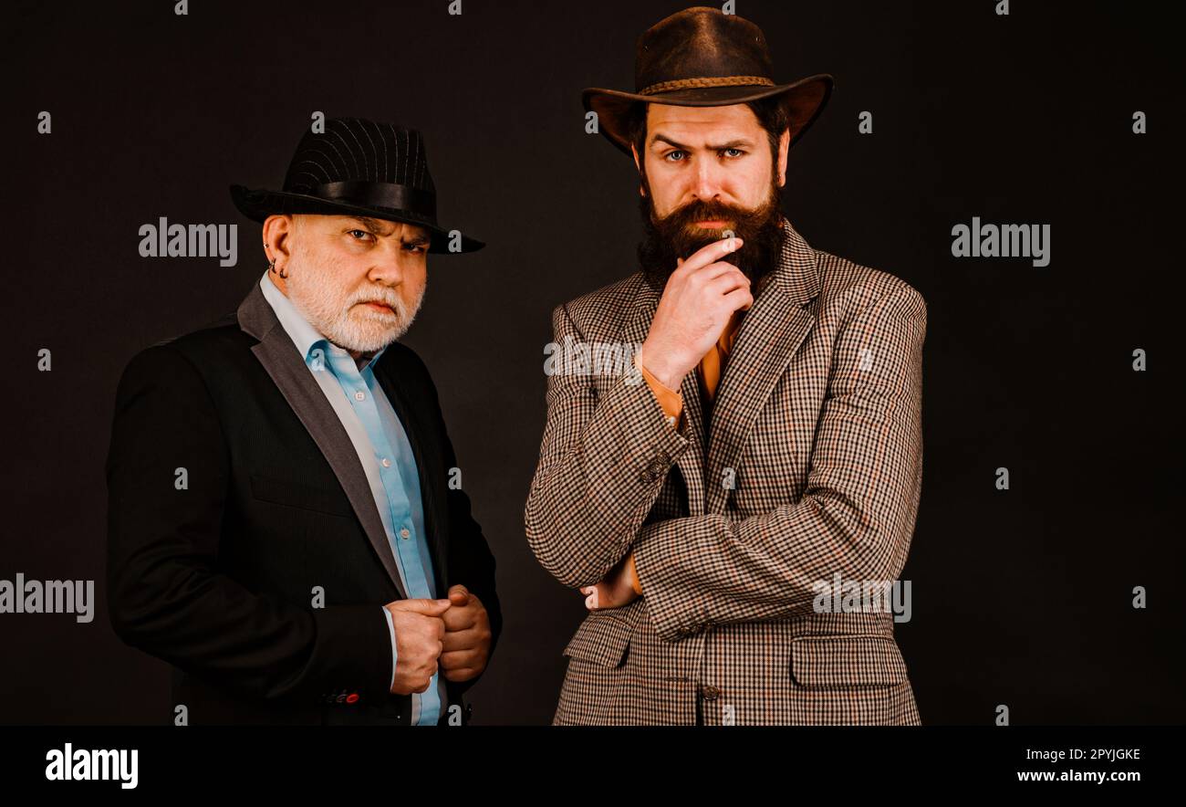 Head shot portrait of elderly mature dad and grownup son. Two male ...