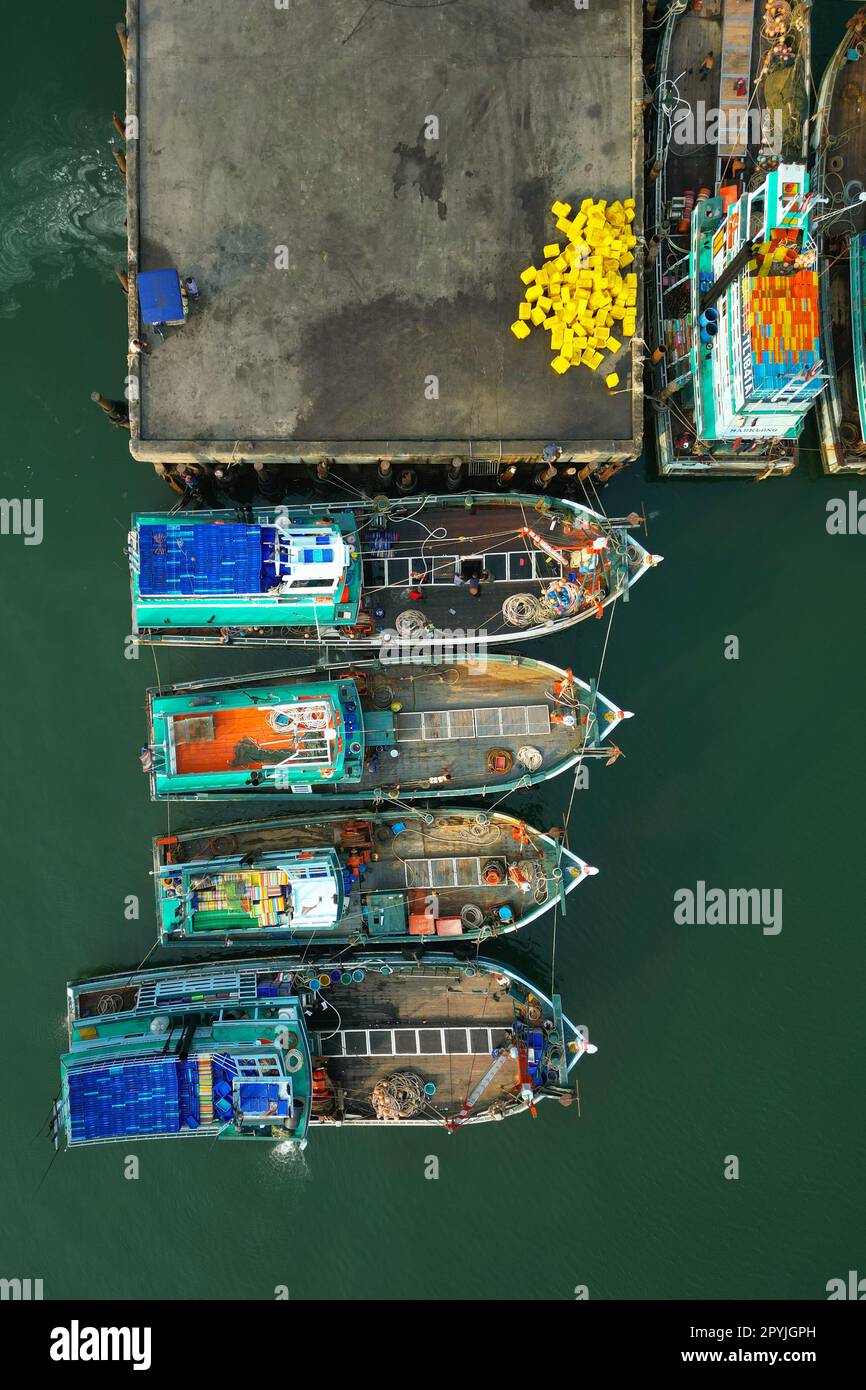 asian fisherman boat ,docks at the harbor Stock Photo - Alamy