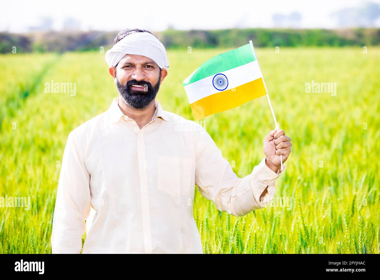 Indian farmer holding indian flag hi-res stock photography and images ...