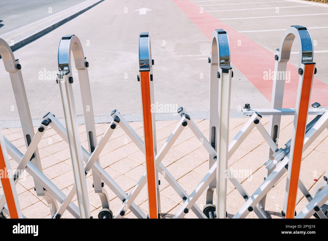 Mobile and portable and movable fence at city street. Public event and ...