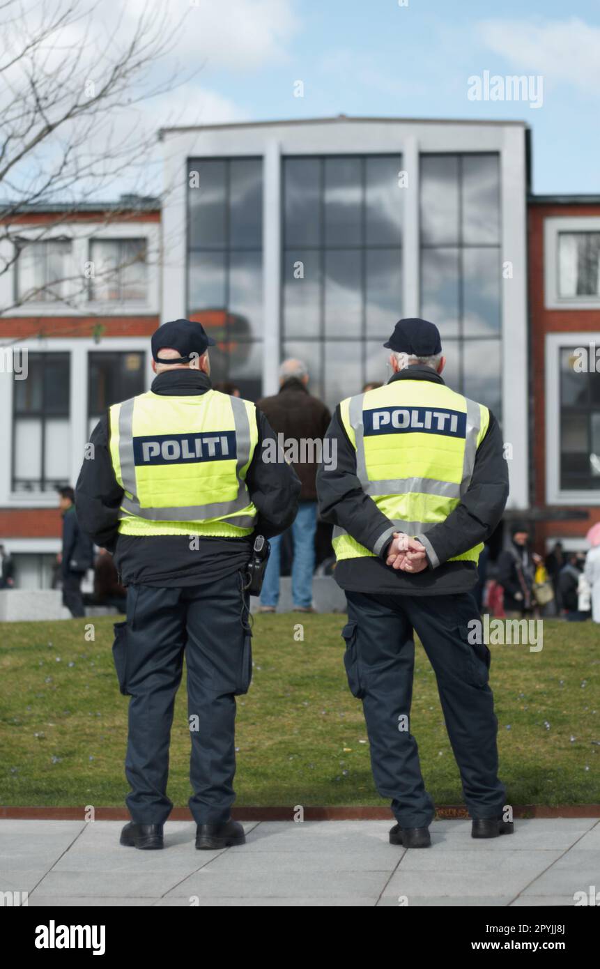 Law enforcement, protection and security with police officer in city ...