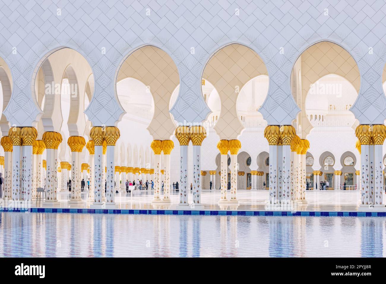 15 January 2023, Abu Dhabi, UAE: Majestic arches tower over a tranquil ...