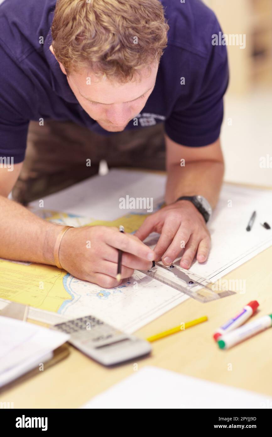 Map, man working and sea marine investigation with a drawing and ruler ...