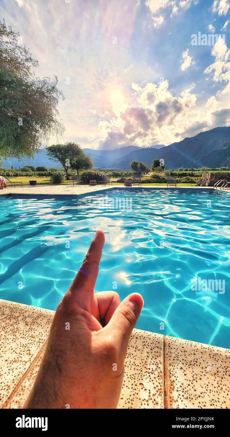 Swimming pool shadow of a hand hi-res stock photography and images - Alamy