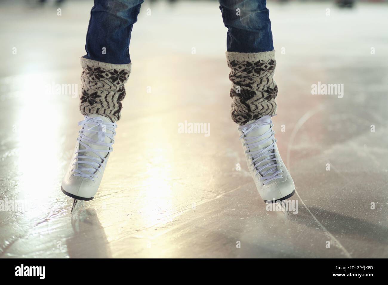 Ice skates, woman shoes and legs of skater training, recreation and ...