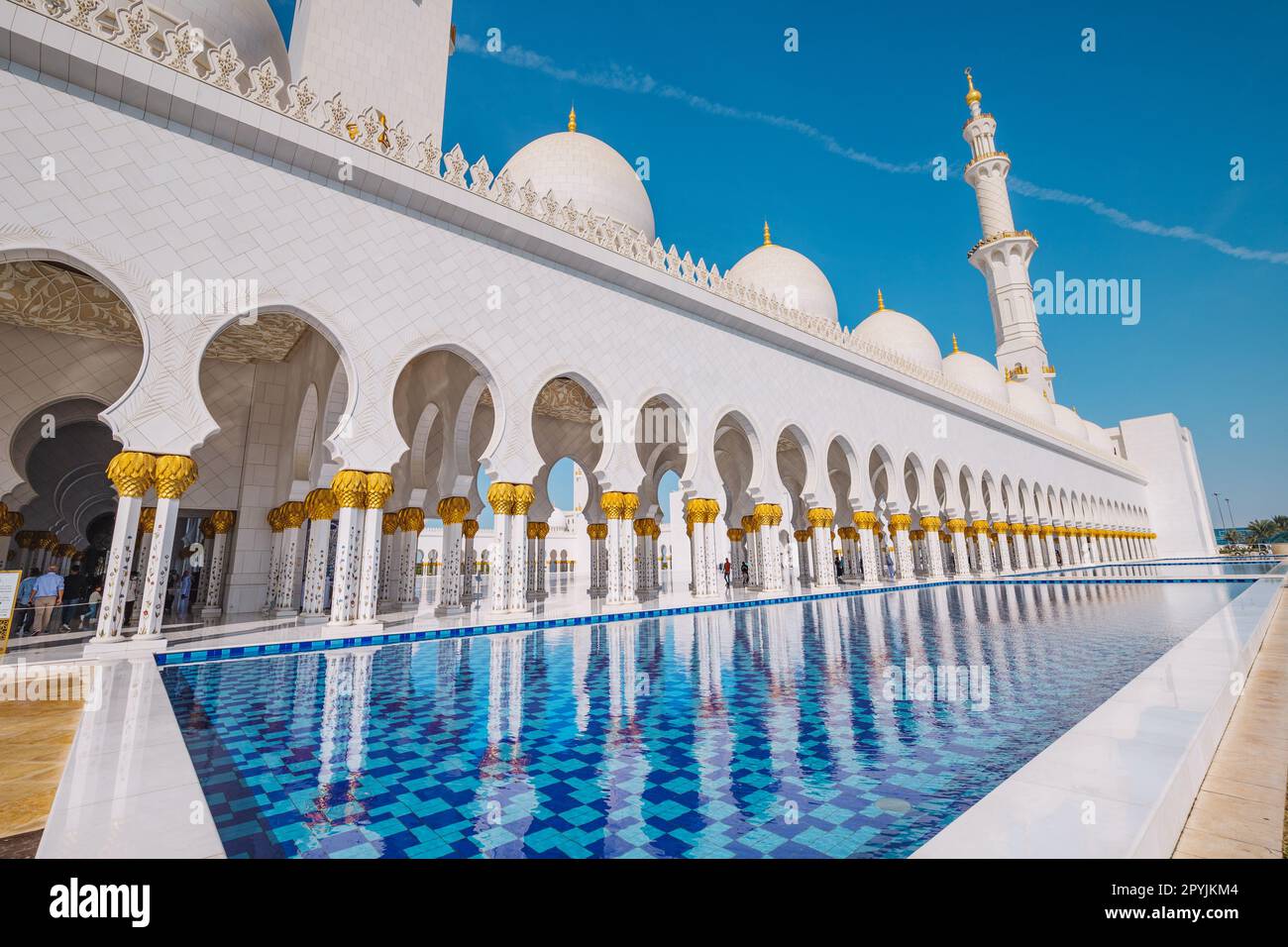 15 January 2023, Abu Dhabi, UAE: Majestic arches tower over a tranquil ...