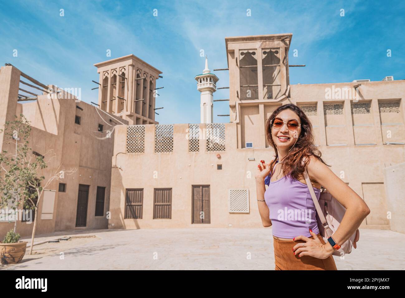 Tourist girl at Al Fahidi historical district and Bur Dubai ...