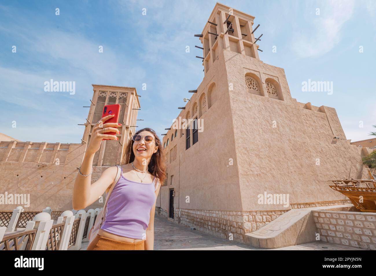 In The Heart Of Dubais Historic Al Fahidi District A Happy Girl