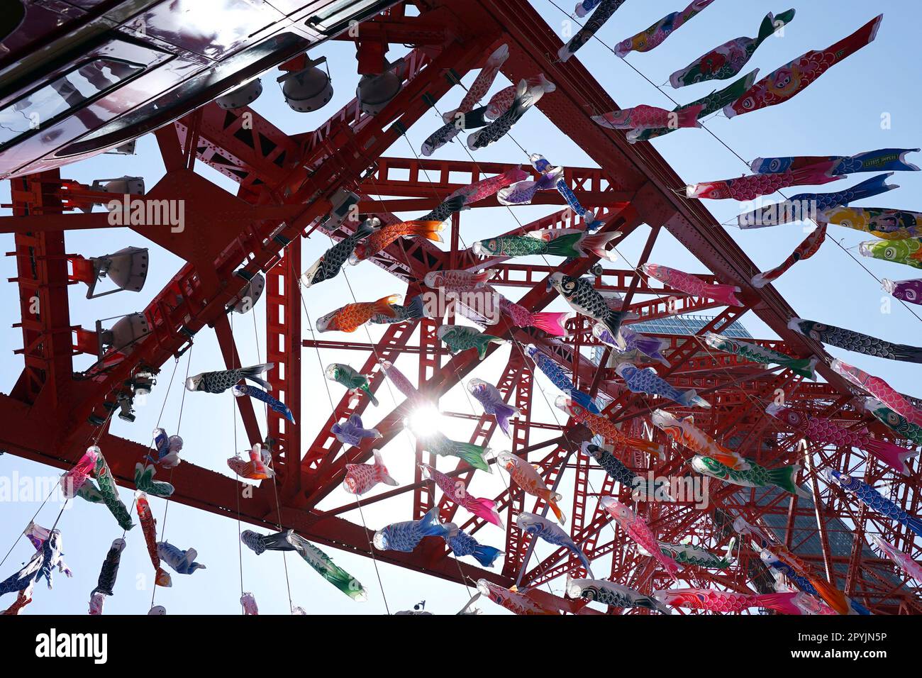 Colorful carp streamers flutter in the air at the bottom of Tokyo Tower ...