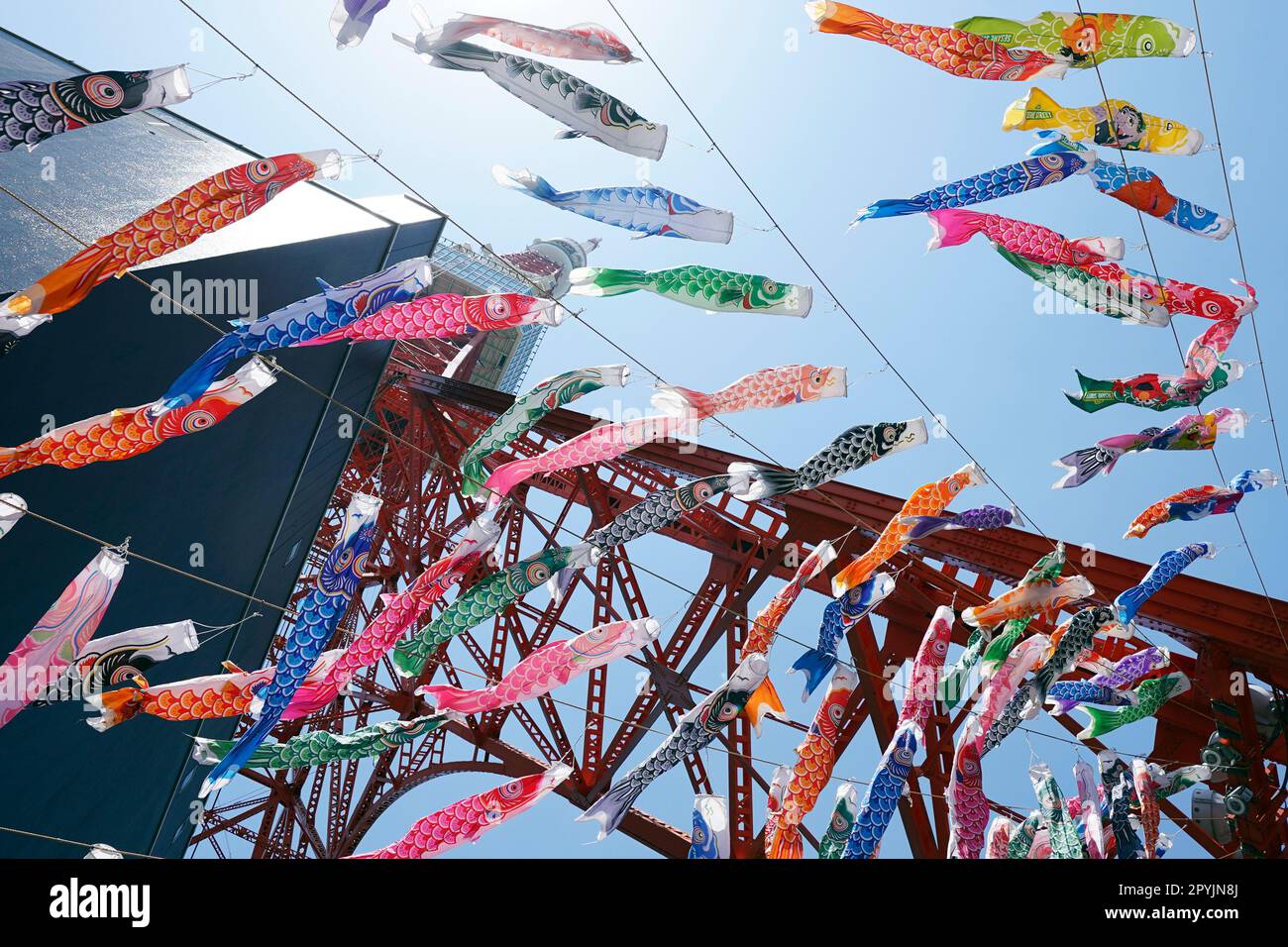 Colorful carp streamers flutter in the air at the bottom of Tokyo Tower ...