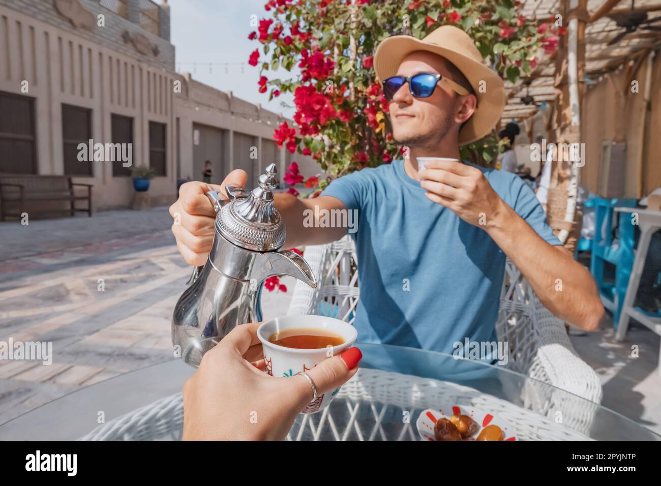 As he takes a break from his travels in Dubai, a man finds respite in a ...