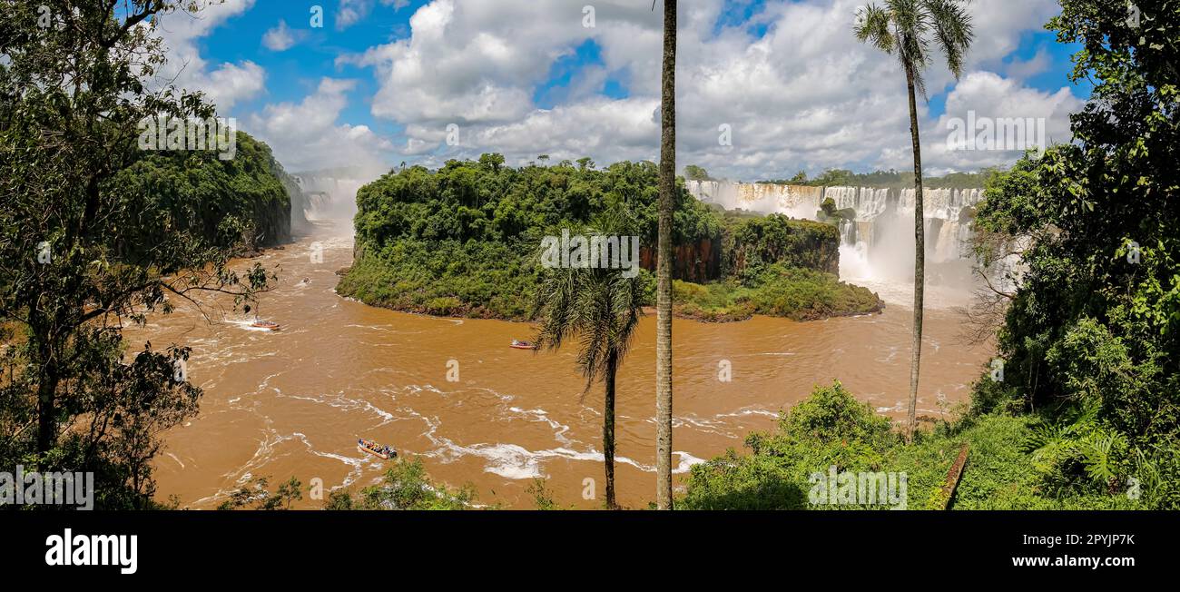Panorama of Isla San Martin with brown river and falls in background ...