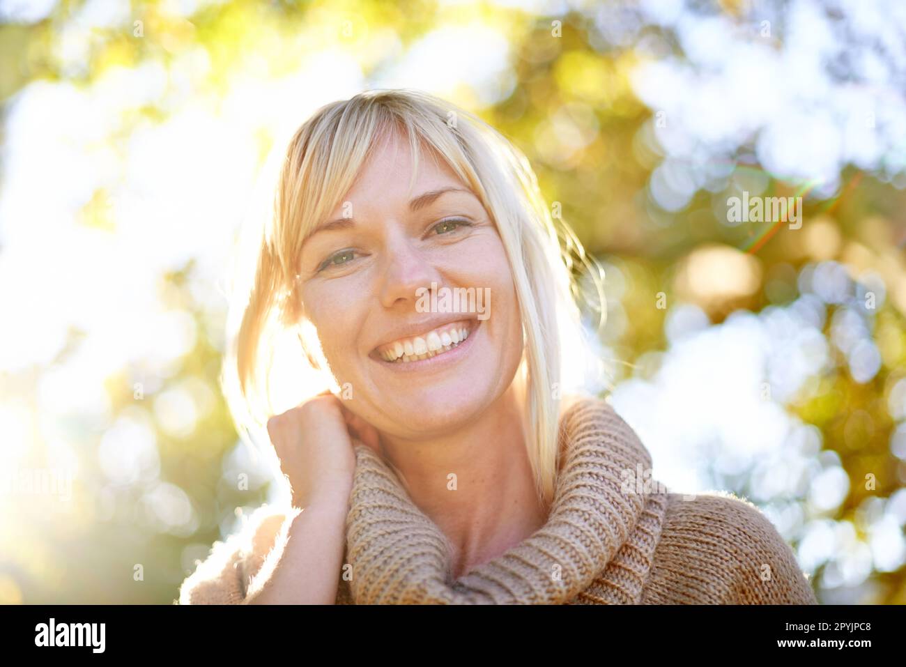 Women, face and smile portrait outdoor in nature with trees, happiness ...