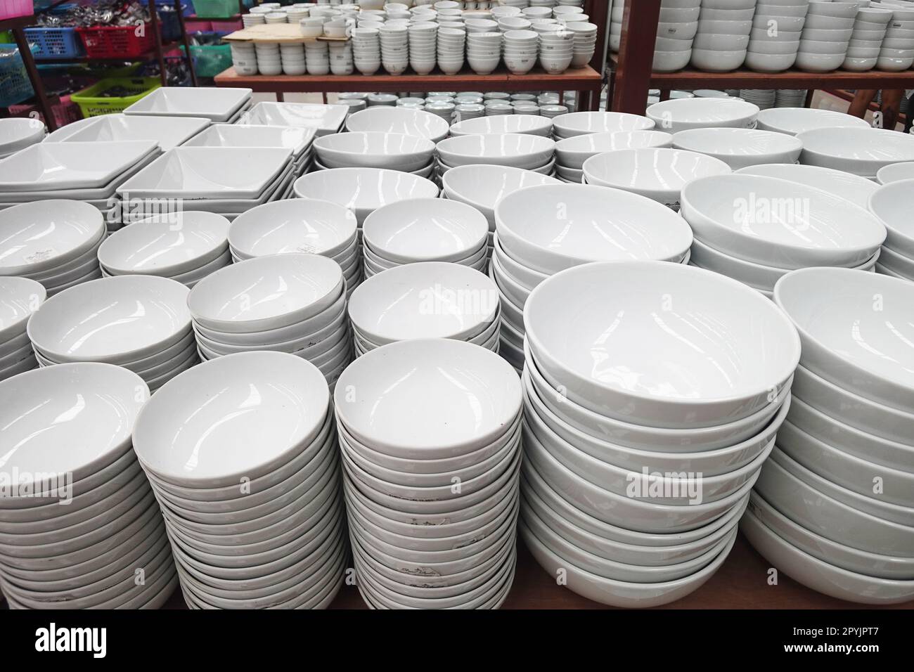 Stacks of plates in a shop Stock Photo - Alamy