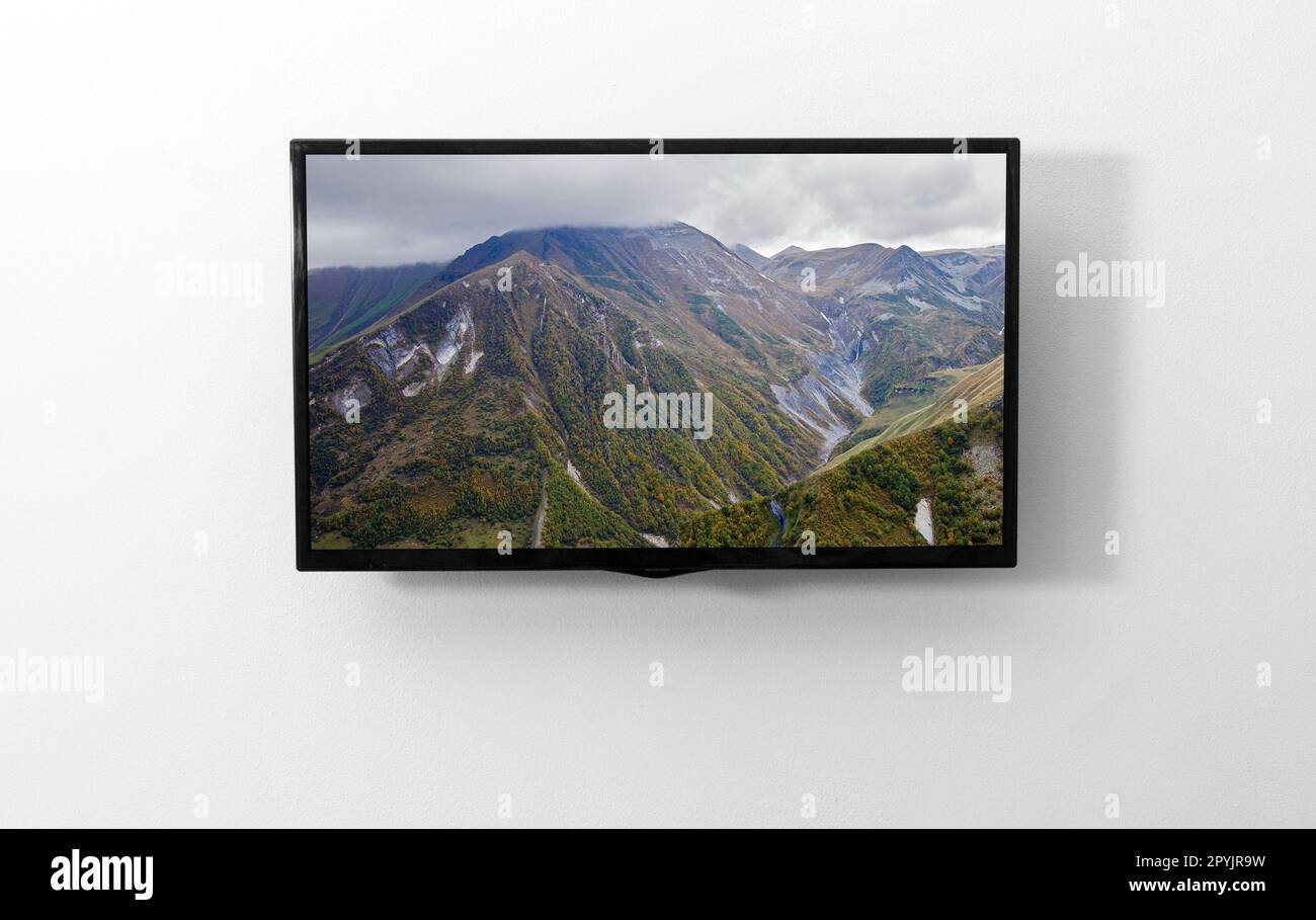 TV monitor on the wall Stock Photo - Alamy