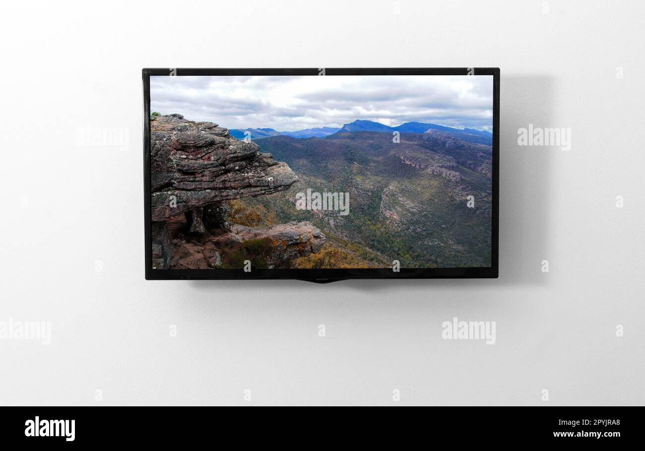 TV monitor on the wall Stock Photo - Alamy