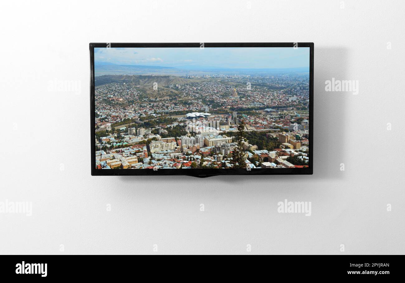 TV monitor on the wall Stock Photo - Alamy