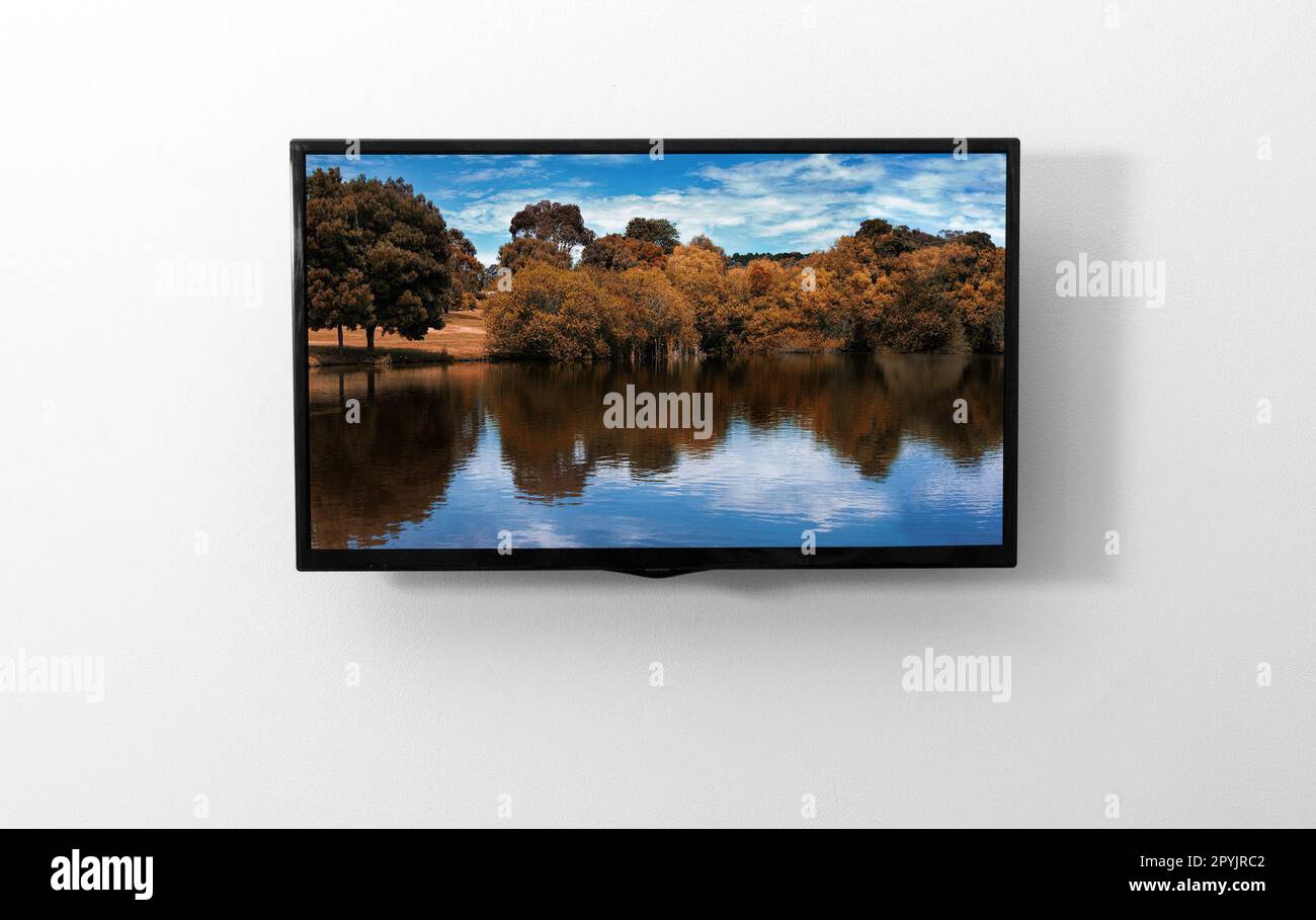TV monitor on the wall Stock Photo - Alamy