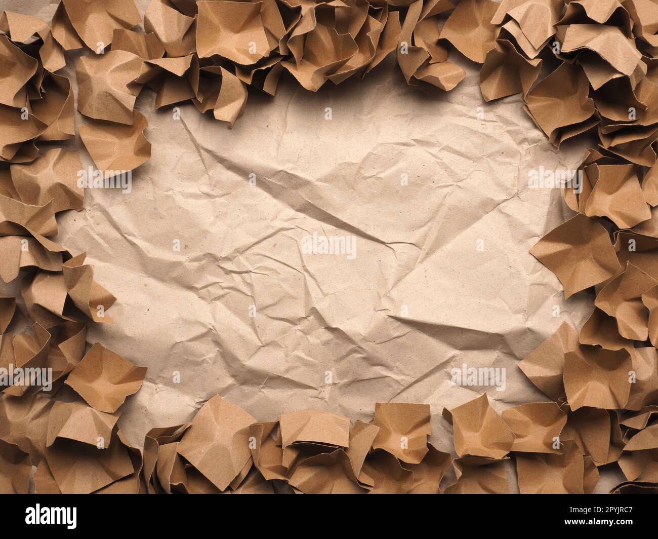 Frame made from recycled paper packaging material on a crushed recycled ...