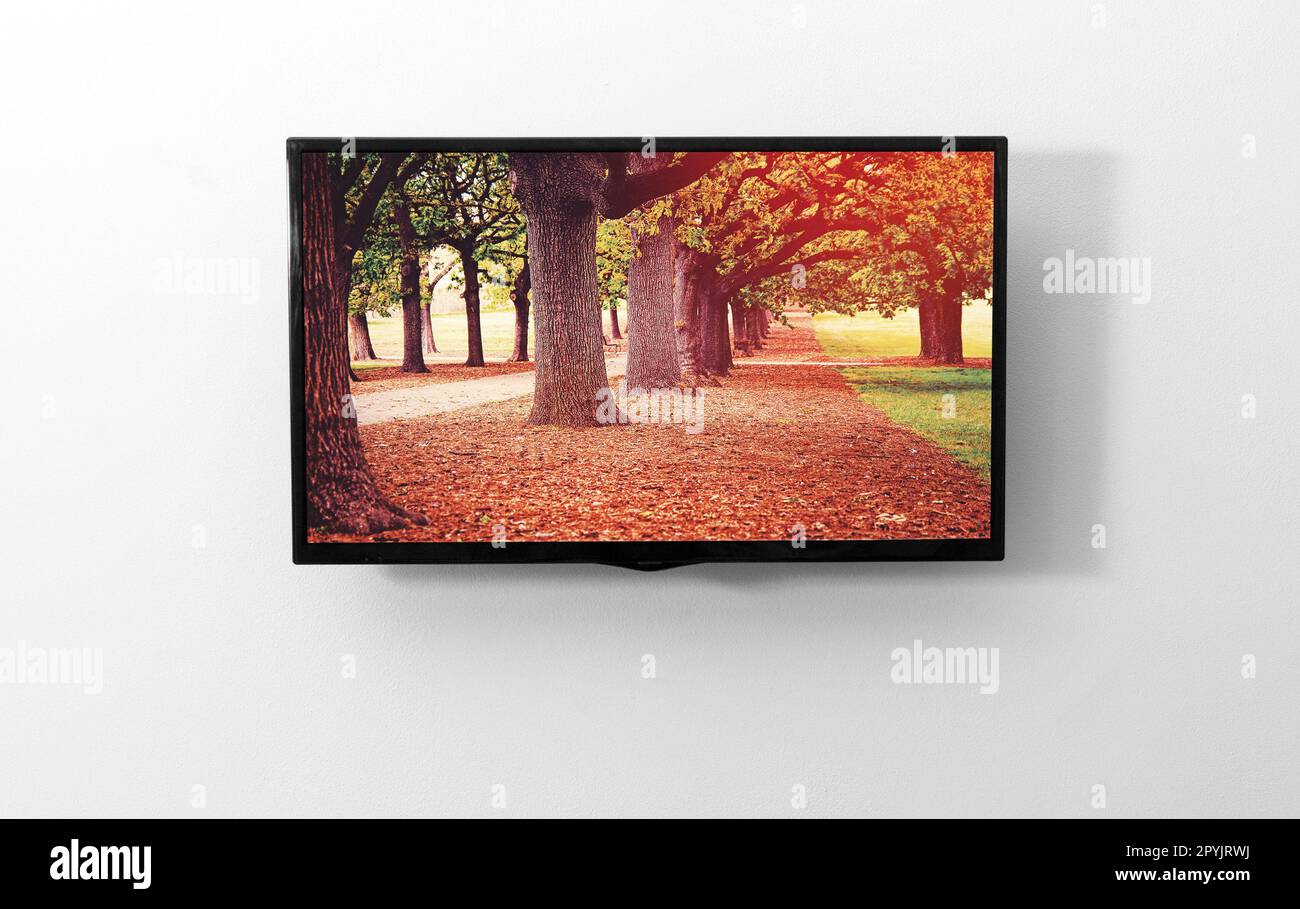 TV monitor on the wall Stock Photo - Alamy