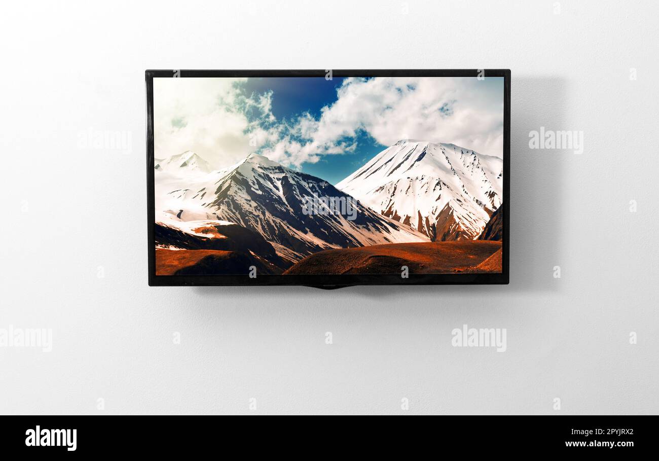 TV monitor on the wall Stock Photo - Alamy