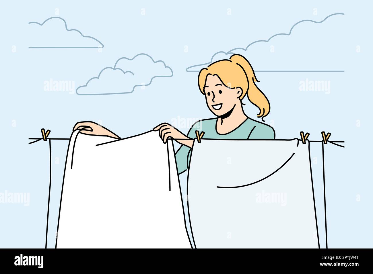 Smiling woman hanging fresh clothes on wire to dry outdoors. Happy ...