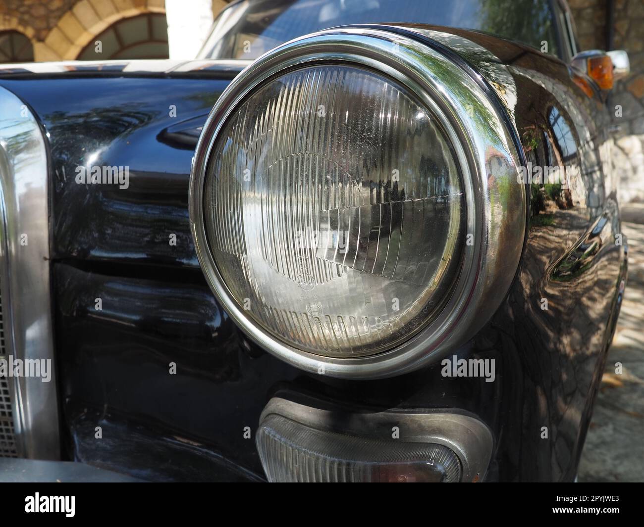Vintage old headlight of a Mercedes Benz car, pontoon model. Retro car ...
