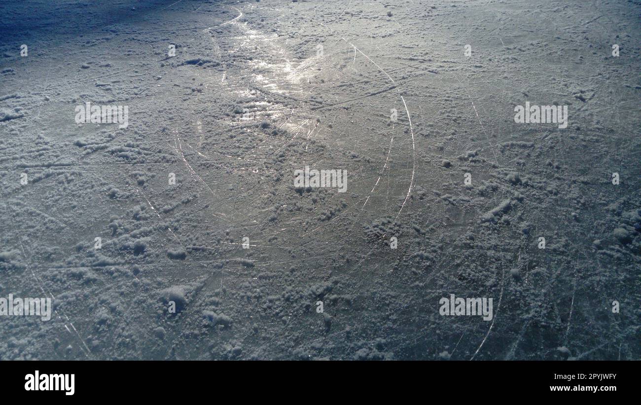 Ice streaked with the tip of figure skates. Figure skating on ice. The ...