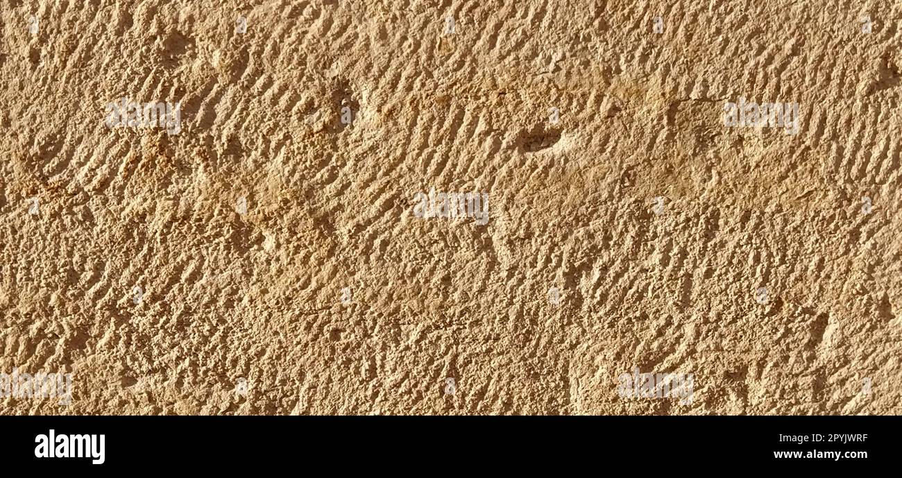 Beautiful sandstone, compacted sand. Stone texture on an old marble ...